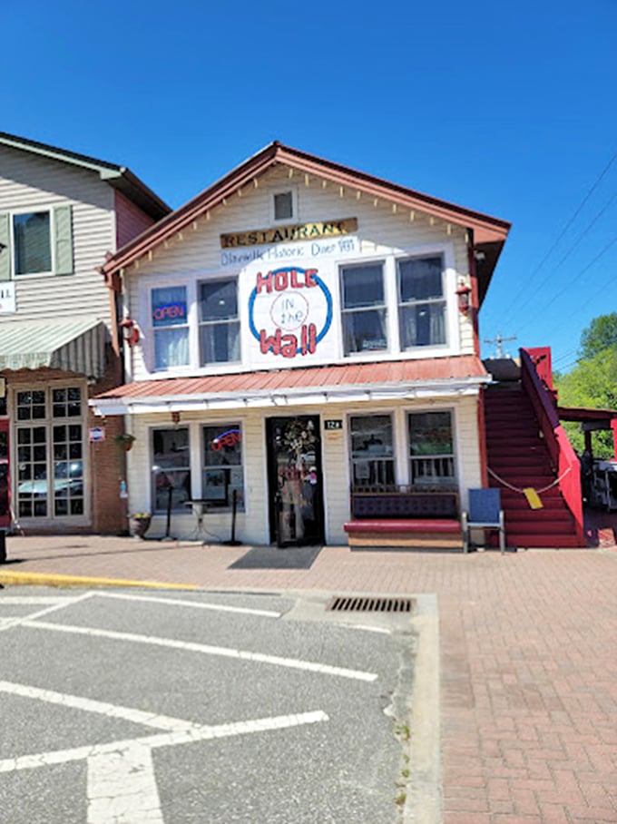 The historic diner stands like a breakfast lighthouse, guiding hungry travelers to a safe harbor of homestyle cooking.