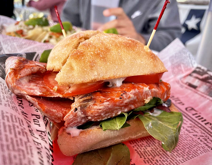 This sandwich isn't just lunch—it's architecture. Layers of flavor stacked between bread with structural integrity that would impress Frank Lloyd Wright. 