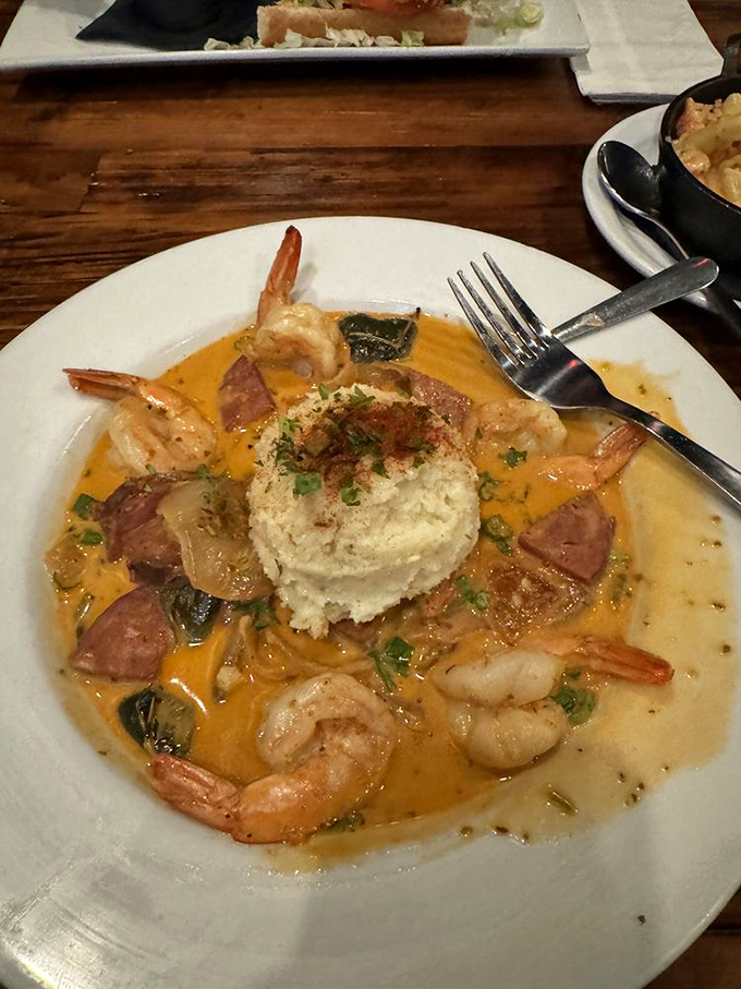 It's a symphony in a bowl—where shrimp dance around andouille, all taking turns dipping into that heavenly mound of buttery grits.