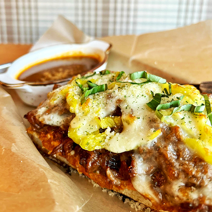 This sandwich doesn't just satisfy hunger—it creates food memories. Melty cheese, tender beef, and pepperoncini on toasted bread with a side of pure joy.