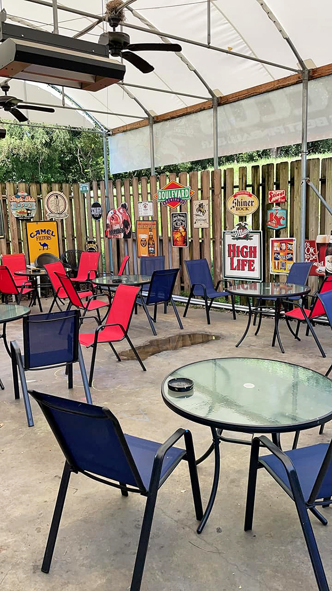 Beer signs and sunshine create the perfect backdrop for afternoon conversations that inevitably turn into evening pinball tournaments.