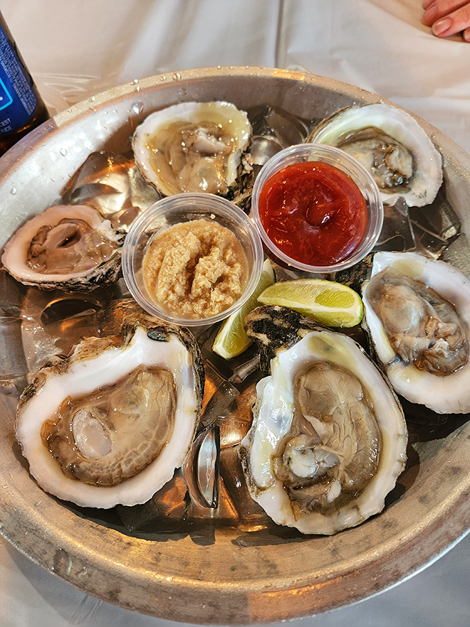 These oysters aren't just served—they're presented like the crown jewels of the ocean, with lime wedges standing by for a citrus coronation.
