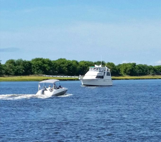 The view that comes complimentary with every meal – boats gliding past as you contemplate a second order of crab cakes.