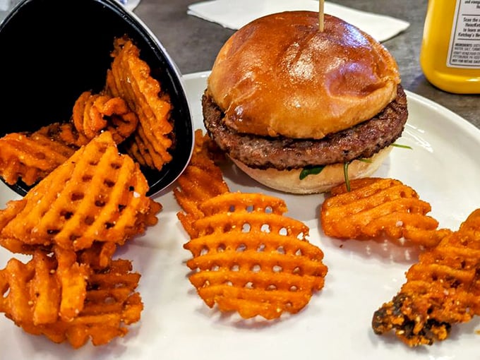 This isn't your average arcade burger—it's what you deserve after burning thousands of calories through pure adrenaline and competitive spirit.