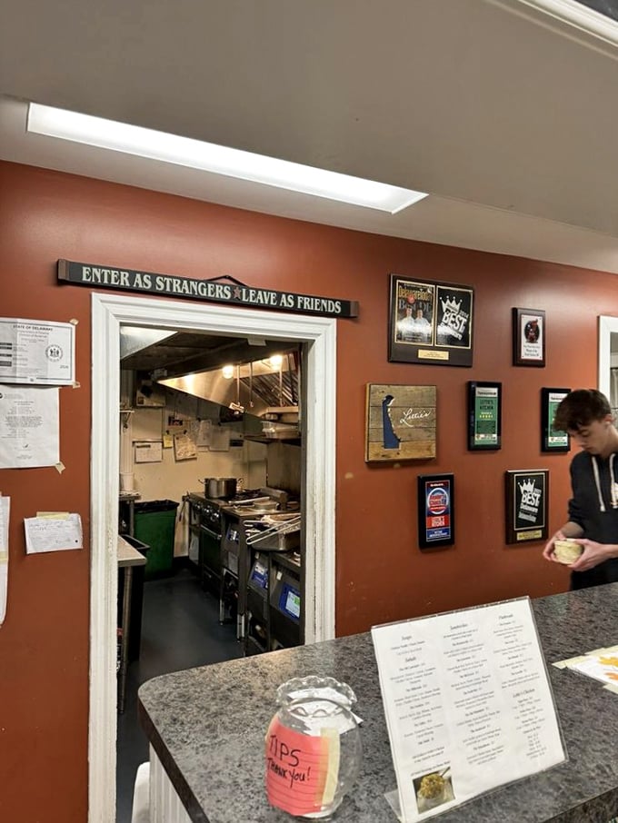 "Enter as Strangers, Leave as Friends" isn't just a sign—it's the philosophy that seasons everything coming out of this kitchen.