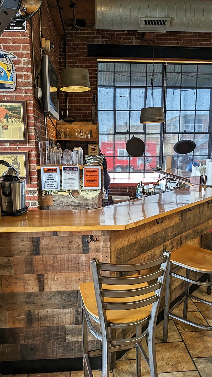 Exposed brick, wooden beams, and a bar that says "stay awhile" – the perfect backdrop for serious barbecue contemplation.
