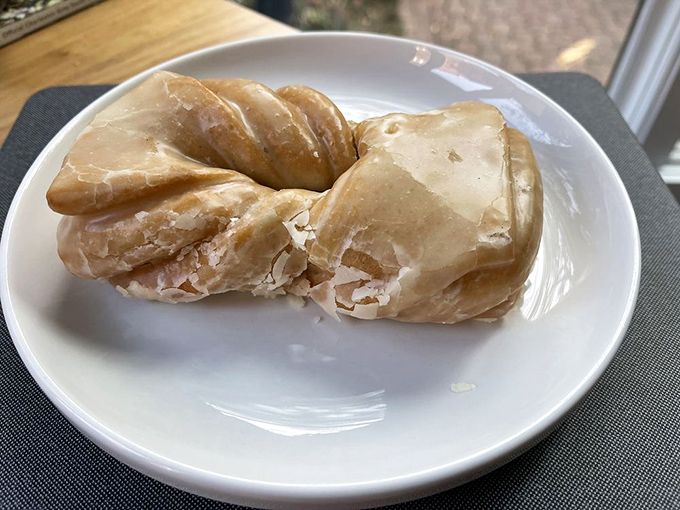 The twisted perfection of Nord's "French Fries"—not actually fries, but cinnamon-sugar dressed donut strips that make you question everything you thought you knew about breakfast.