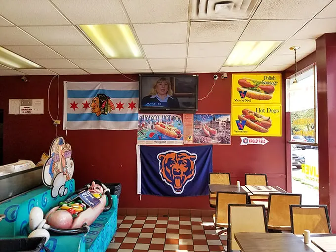 Sports flags and hot dog posters—the interior decorating style best described as "Pure Chicago With Extra Pride."