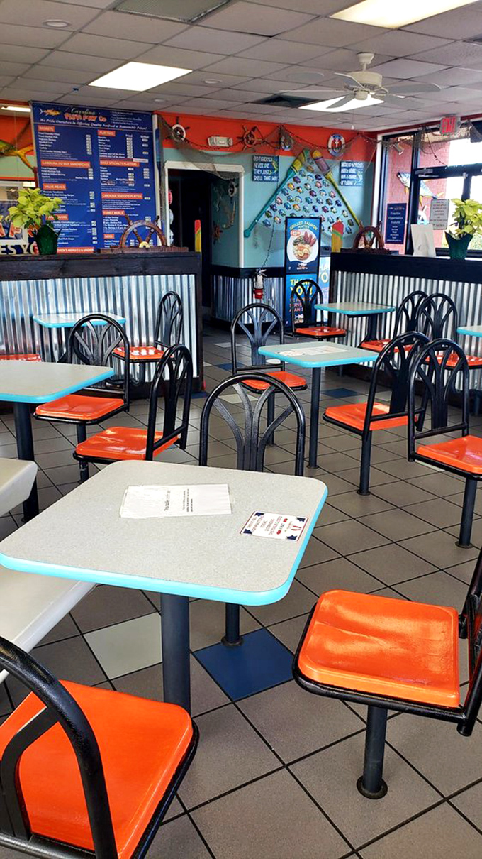 The quiet before the storm – empty tables waiting to become scenes of seafood revelry and napkin-required enthusiasm.