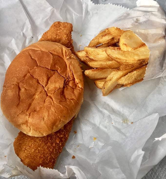 The breaded pork tenderloin sandwich—crispy, juicy, and larger than its bun in the best possible way.