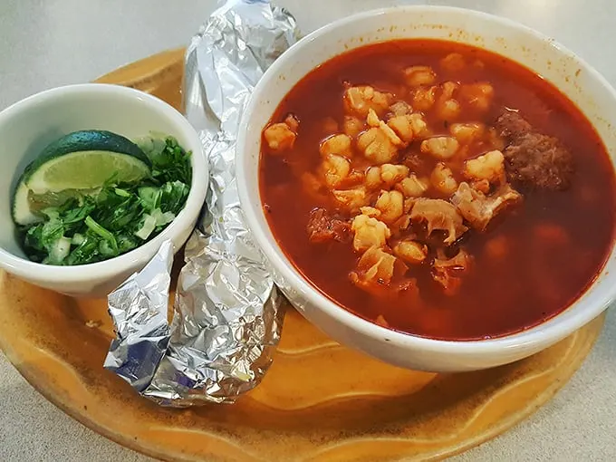 Menudo or pozole? Either way, this hearty soup with fresh lime and cilantro is the cure for whatever ails you.