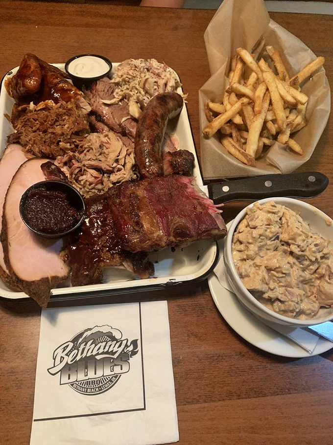 The Ultimate BBQ Sampler: where decisions are unnecessary and gluttony is encouraged—a meat lover's dream team assembled on a single glorious plate.
