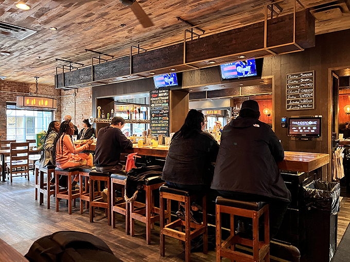 The bar at The Eagle isn't just serving drinks—it's hosting a community of food lovers united in their quest for Southern comfort.