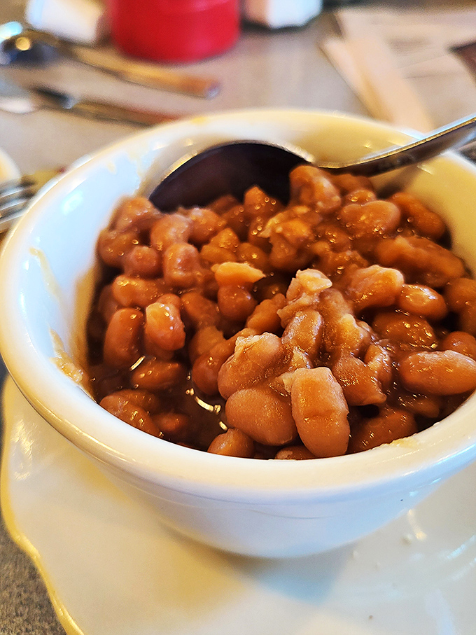 These baked beans aren't just a side dish—they're a New England tradition in a bowl. Sweet, savory, and substantial enough to fuel a mountain hike.