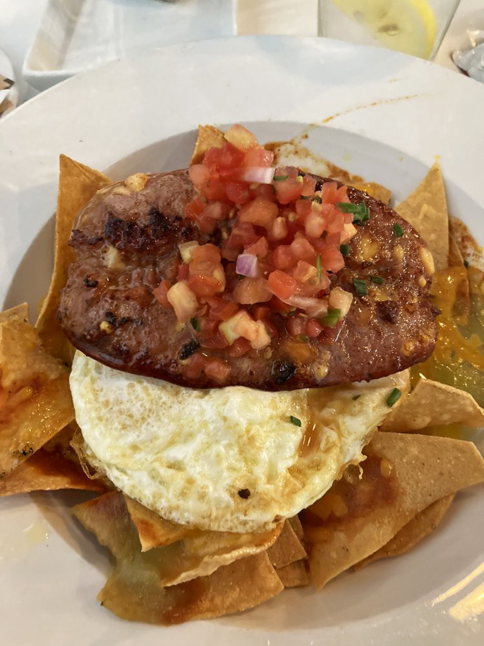 Not all heroes wear capes—some come topped with fresh pico de gallo. This dish bridges cultures with the diplomacy of perfectly cooked eggs.