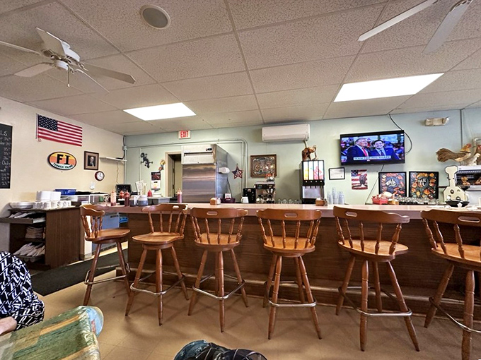 The counter seats—where solo diners become temporary family and the coffee refills flow like conversation between old friends.