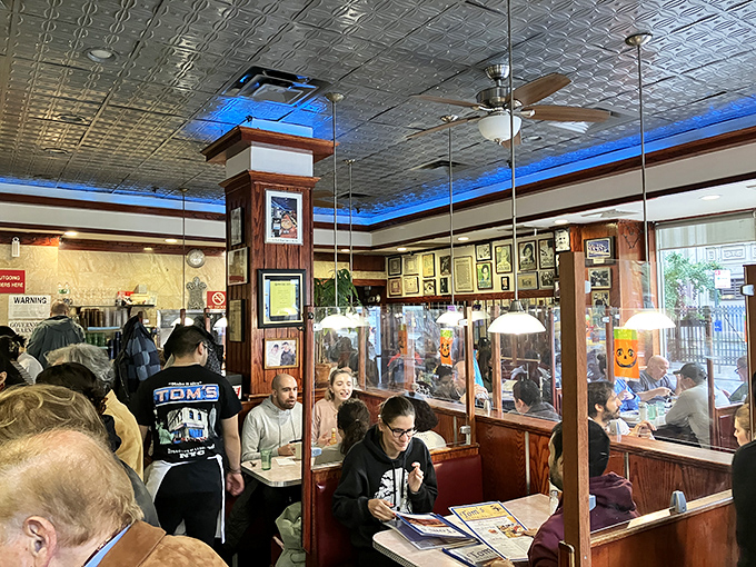 Every booth tells a story, while the walls display the history of a restaurant that's become as much a community center as a place to eat.