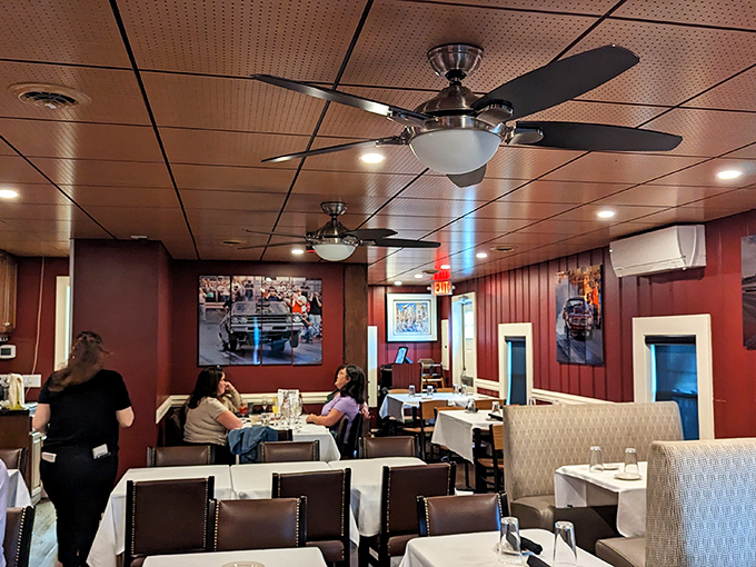 A dining room where conversations flow as smoothly as the wine, with enough space between tables to ensure your dinner gossip stays private.