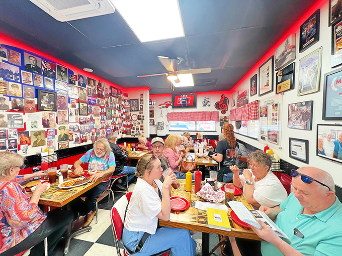 Where strangers become friends over shared onion burger appreciation. The wall of memories tells stories of those who came, ate, and conquered.