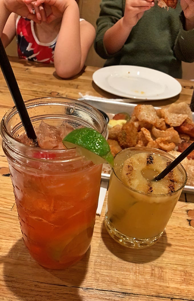 Cocktails that understand their mission: to cool the heat, complement the meat, and make you forget you've already unbuttoned your pants.