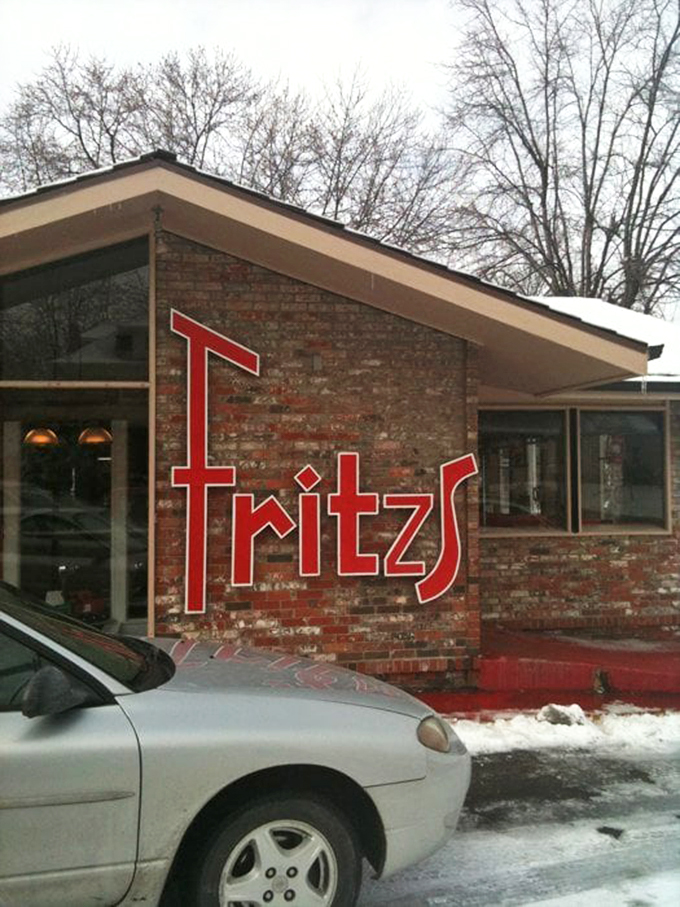 Winter can't stop the Fritz's faithful—the bold red lettering against brick stands as a beacon for those seeking comfort food with a side of whimsy.