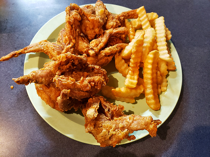 These frog legs aren't just fried—they're transformed into crispy, golden morsels that convert skeptics into believers.
