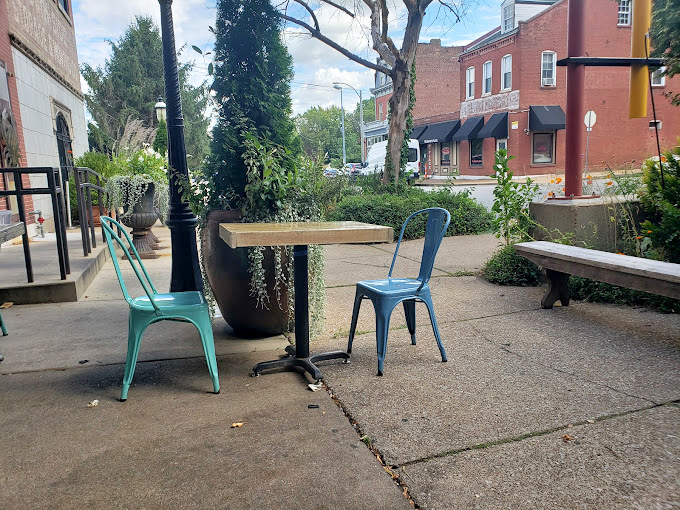 The sidewalk seating offers prime people-watching with your seafood feast – a front-row seat to the neighborhood's comings and goings.