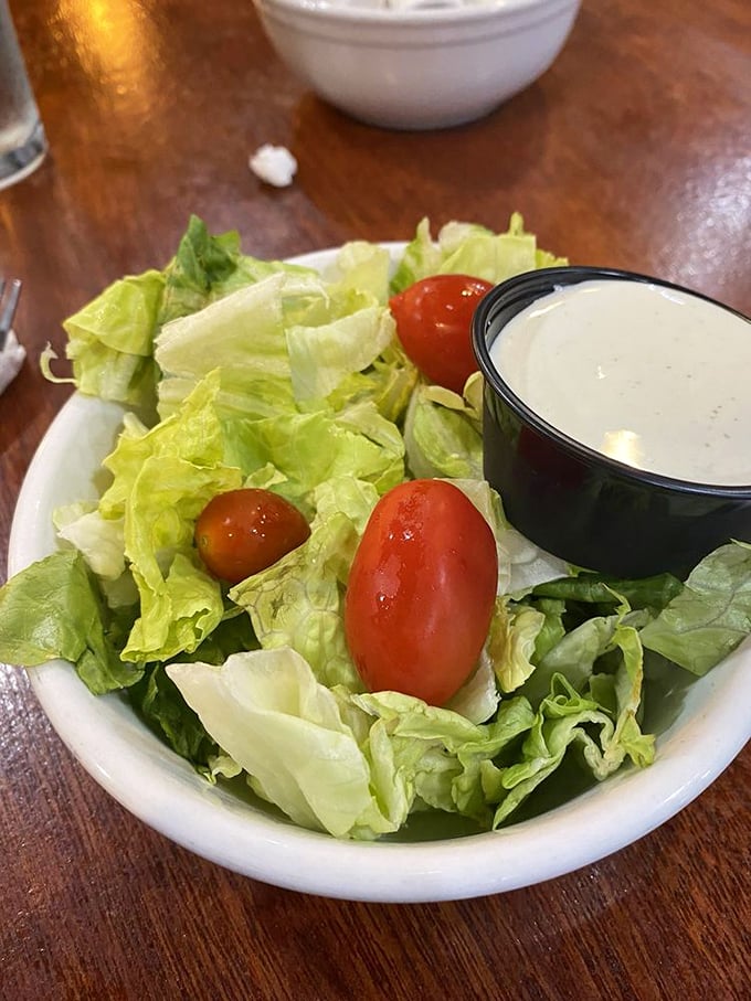 Even the side salad gets respect here—crisp lettuce, ripe tomatoes, and house-made dressing. Because at Rock Springs, details matter.