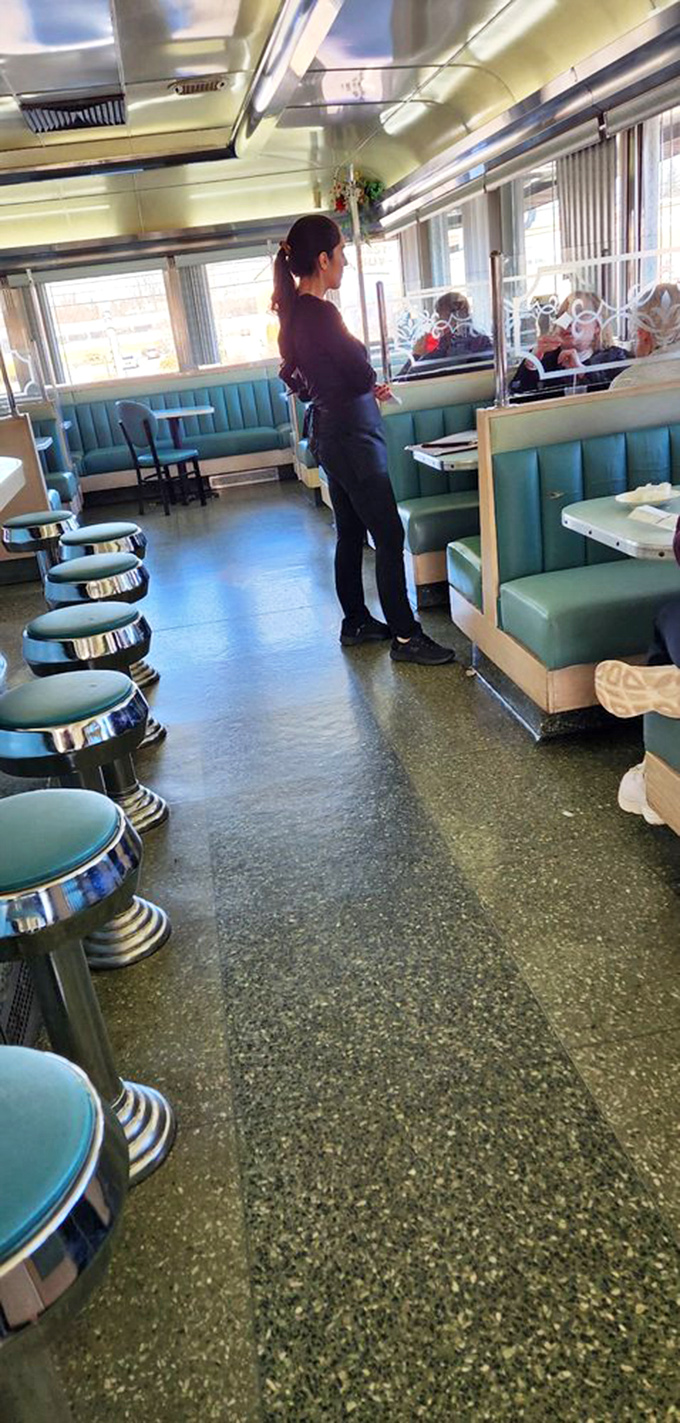 The waitstaff ballet—a choreography of coffee pots and order pads. They don't just serve food; they're curators of the American diner experience.