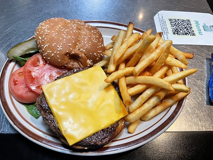 The cheeseburger—perfection in its simplest form. Those fries aren't just side characters; they're co-stars worthy of their own billing.
