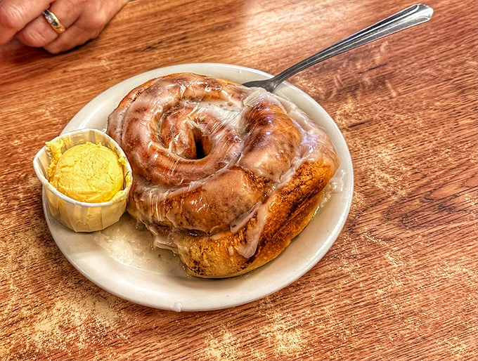 The cinnamon roll—breakfast's answer to "But what if I want cake right now?" A spiral of morning joy with butter melting into every perfect crevice.