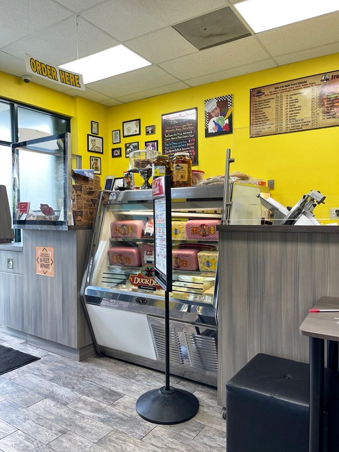 The ordering counter—where dreams become reality and hunger meets its match. That deli case is basically a treasure chest of possibilities.