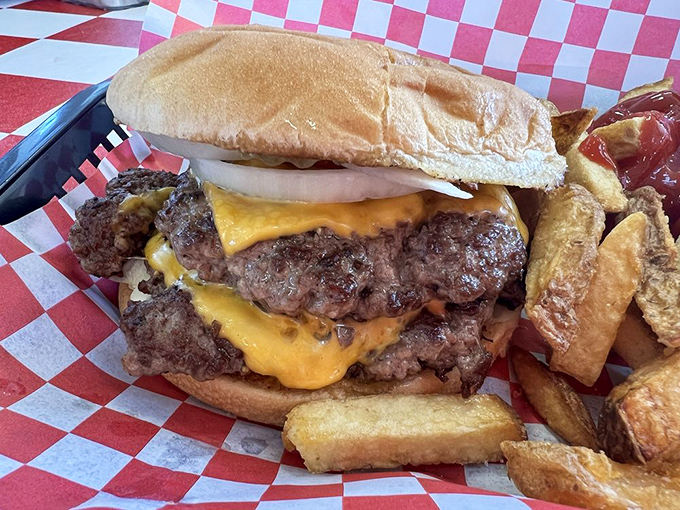 This isn't just a double cheeseburger—it's a monument to American excess done right, with melty cheese cascading down perfectly cooked patties.