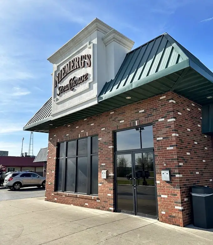 Morning sunshine highlights the restaurant's inviting façade. Like a beacon of hope for empty stomachs everywhere, Niemerg's promises delicious refuge.