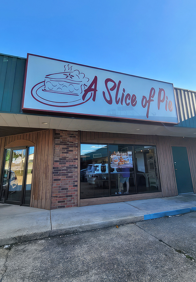 That sign isn't just advertising—it's a beacon of hope for weary travelers seeking solace in the form of perfectly executed pastry and filling.