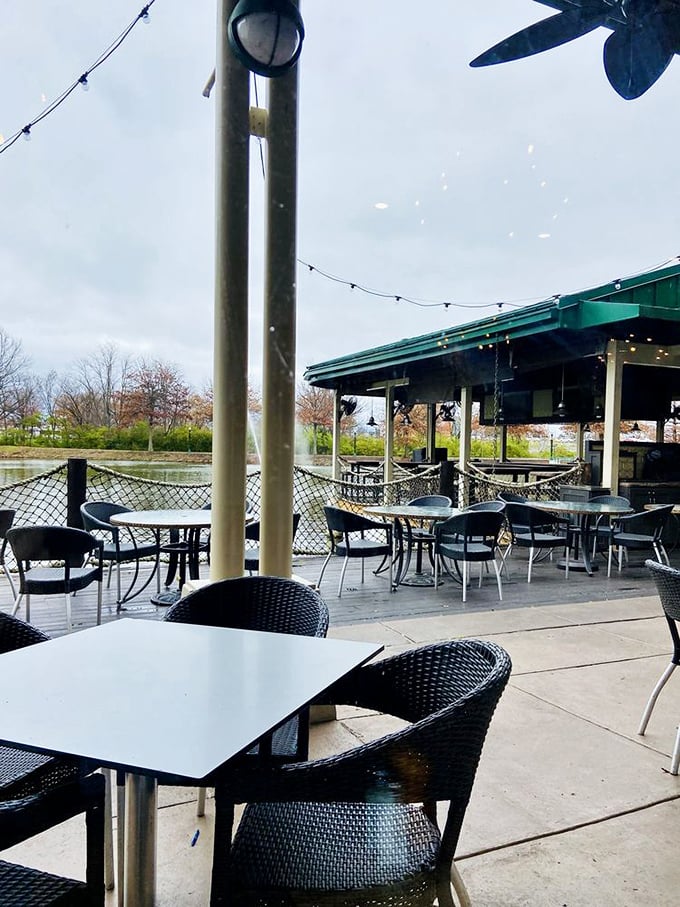 The outdoor seating area proves that fresh air makes everything taste better. Kentucky's version of oceanfront dining without the seagulls eyeing your food.