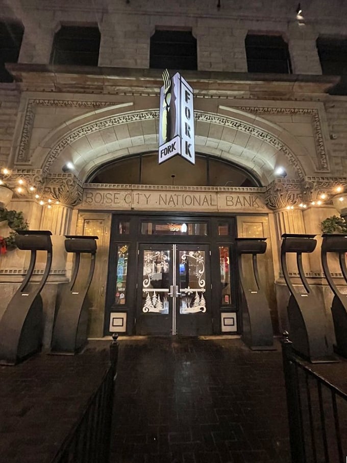 Fork's illuminated nighttime entrance—like a beacon guiding hungry travelers to the promised land of butter cake and huckleberry cocktails.