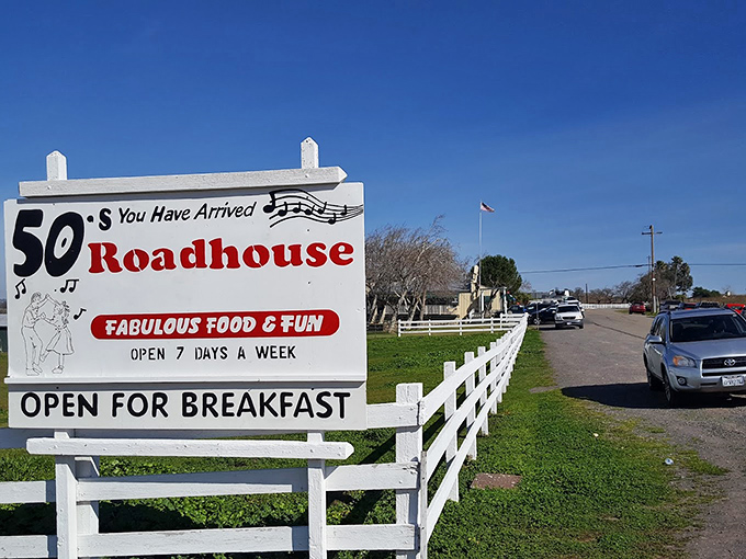 The roadside sign promises exactly what awaits inside—"Fabulous Food & Fun" with a musical note that sets the tone for your entire visit.