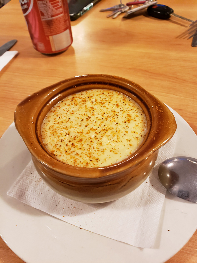 This innocent-looking crock of mac and cheese is about to change someone's life. The browned top is just a preview of greatness.