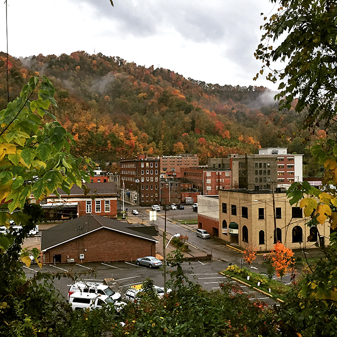 Autumn transforms Logan into a painter's palette of impossible colors, the town's brick buildings providing perfect contrast to nature's fiery display.