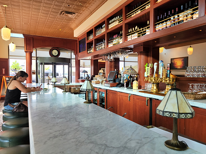 The bar at Ted's isn't just where drinks are served—it's where strangers become friends and food decisions are contemplated with the seriousness they deserve.