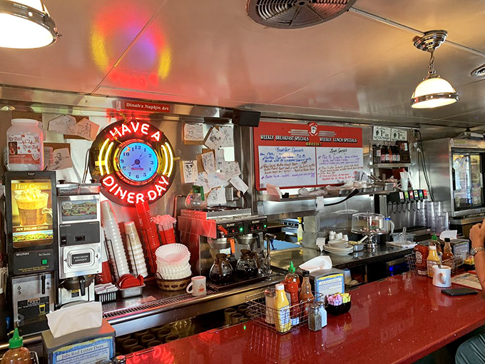 "Have a Diner Day" isn't just a sign—it's a prophecy. The organized chaos behind the counter is a ballet that's been perfected over decades.