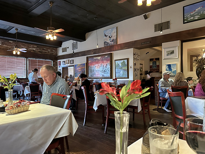 The dining room buzzes with the symphony of clinking glasses and satisfied murmurs—the universal language of "this was worth the drive."