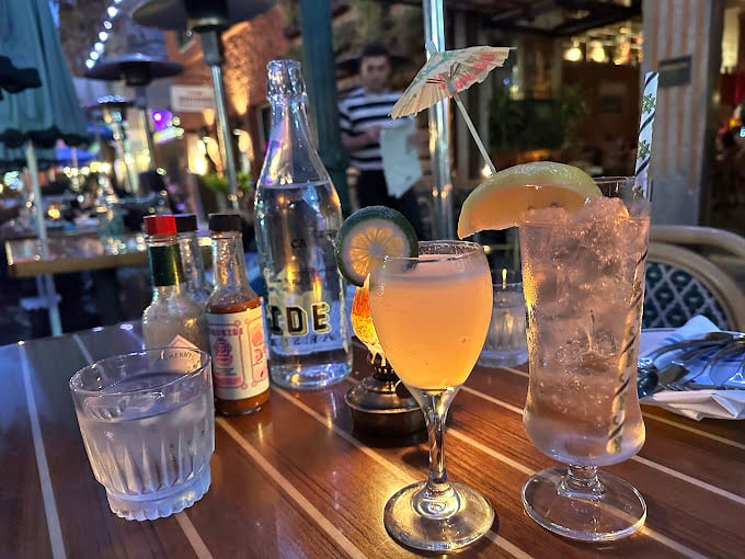 Cocktails at Ironside aren't just drinks – they're liquid vacations, complete with tiny umbrellas that say "your worries can wait."