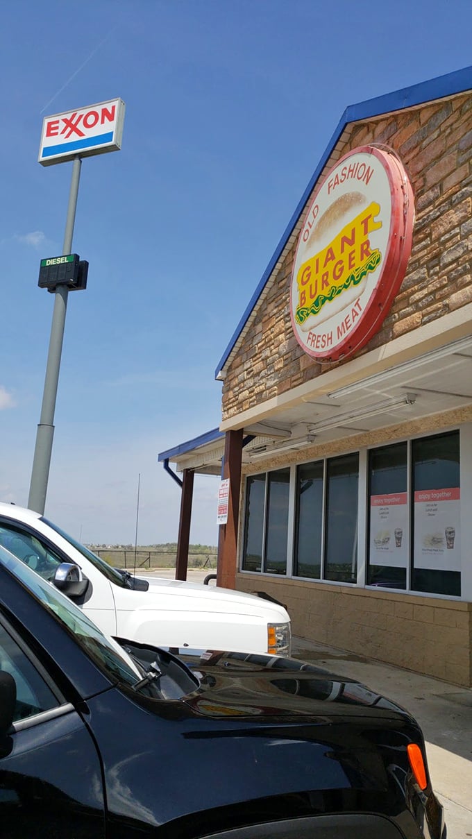 Where the Exxon sign meets burger paradise—proof that sometimes the best food discoveries happen where you least expect them.