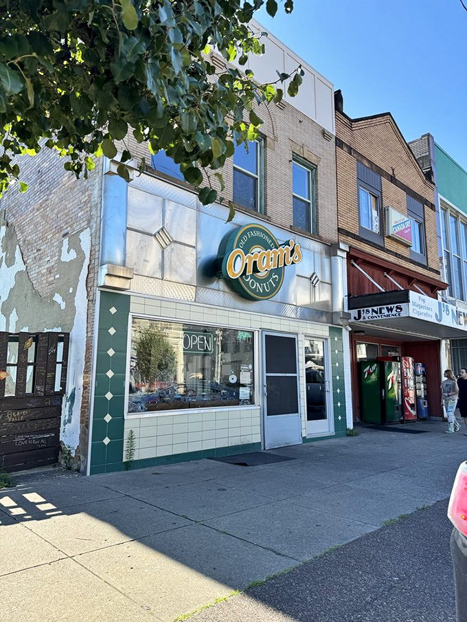 The green and cream façade stands as a beacon of hope for the sugar-deprived. This isn't just a donut shop; it's a Pennsylvania institution. 