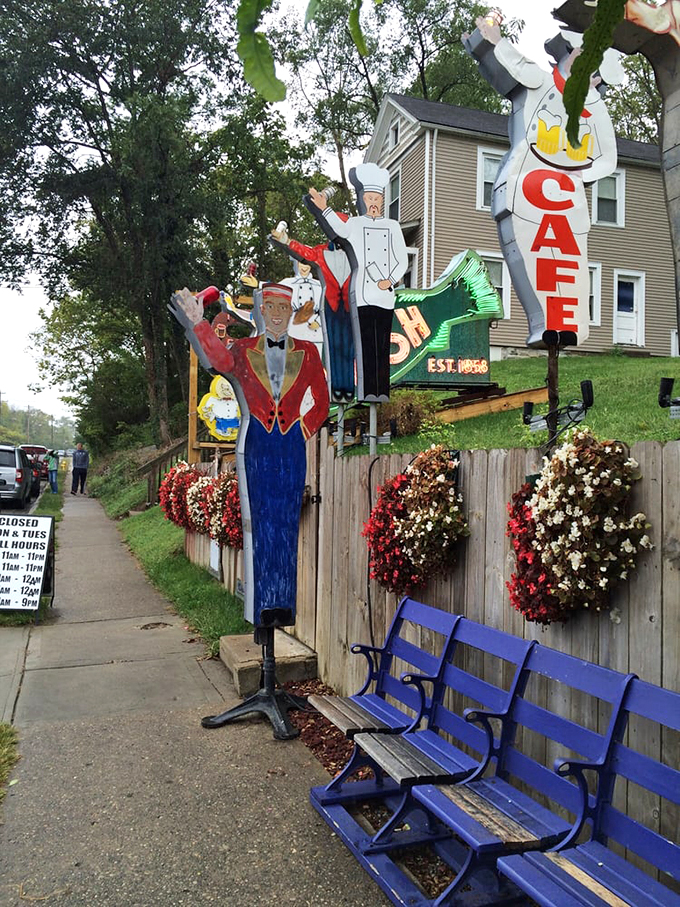 The purple bench—Cincinnati's most whimsical waiting area. Those life-sized figures aren't just decorations; they're the unofficial greeters of gastronomic joy.