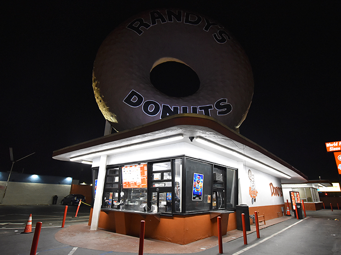 After dark, Randy's glows like a donut lighthouse, guiding sugar-seekers safely to harbor. Even sweeter than it looks in daylight.