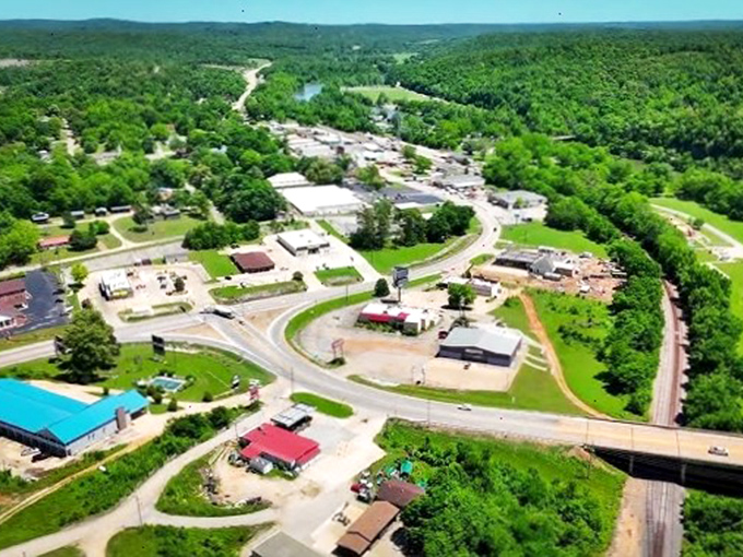 From above, Hardy reveals its perfect balance—a small town nestled between rolling Ozark hills and the sinuous embrace of the Spring River.