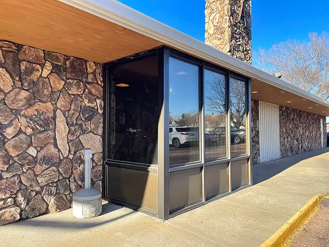 Stone walls that whisper "nothing fancy here" hide Archie's greatest secret: steaks that could make a vegetarian weep with temptation.